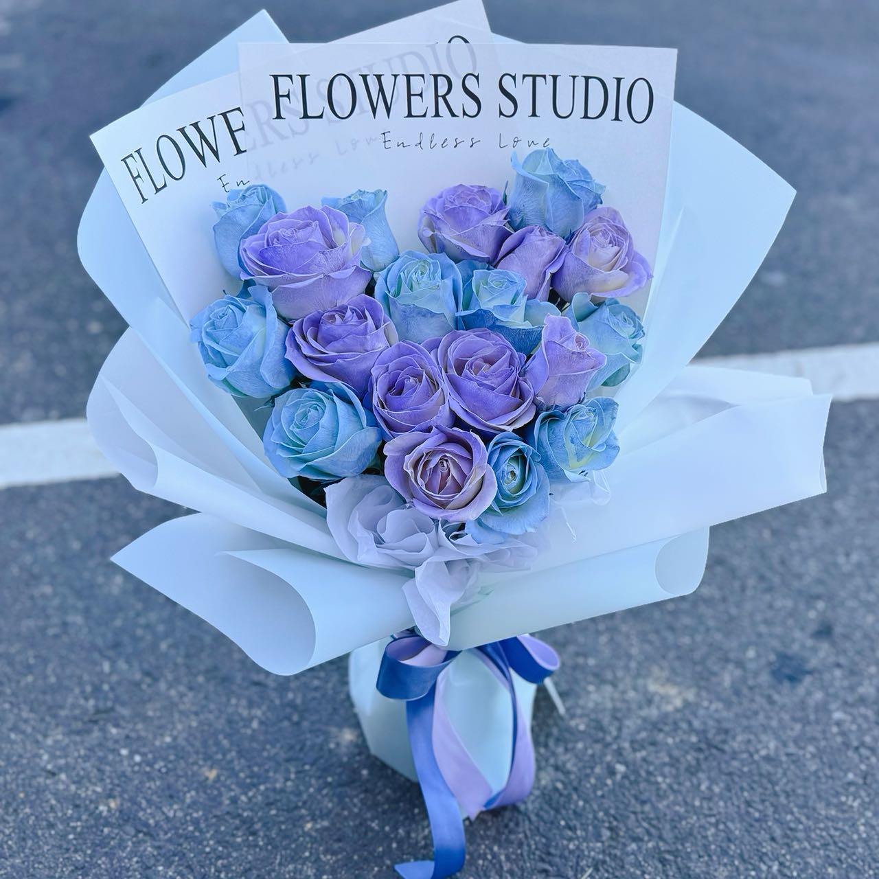 19 Ice Blue & Misty Purple Roses – Mitcham Florist